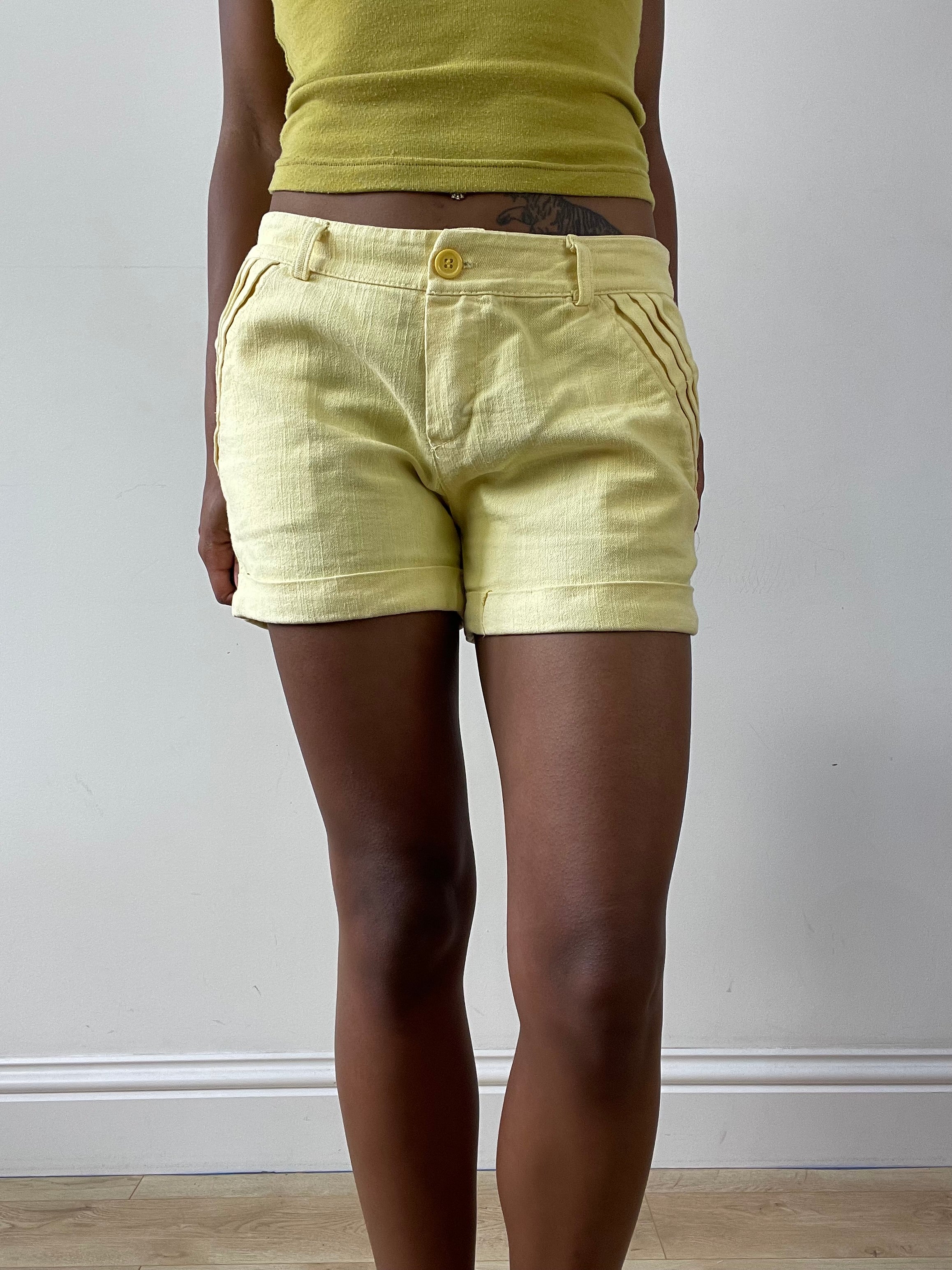 vintage edit twenty-nine | medium yellow mini shorts with pleated pock ...